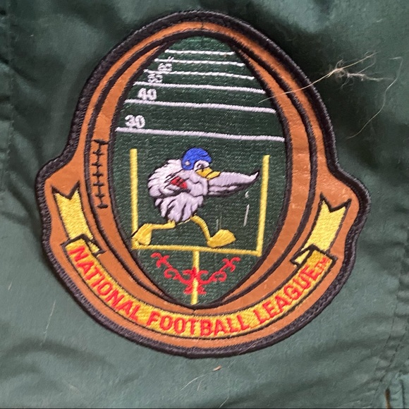 Weird "alternate" NFL league logos on a line of 1990s coats - Sports ...